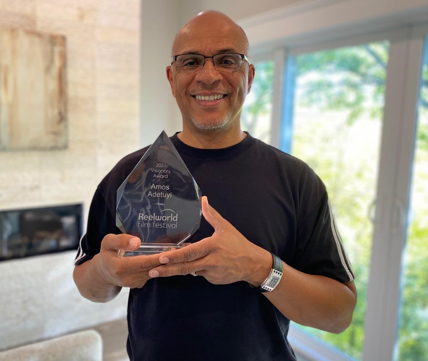 Pierre Laurent recognizes 2021 two time Visionary Award winner Amos Ad ...